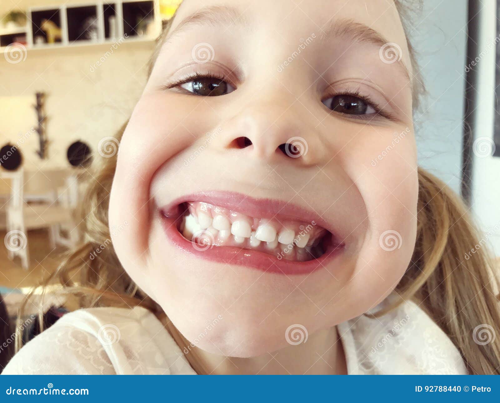 Funny Face of Small Girl with White Teeth Stock Photo - Image of ...