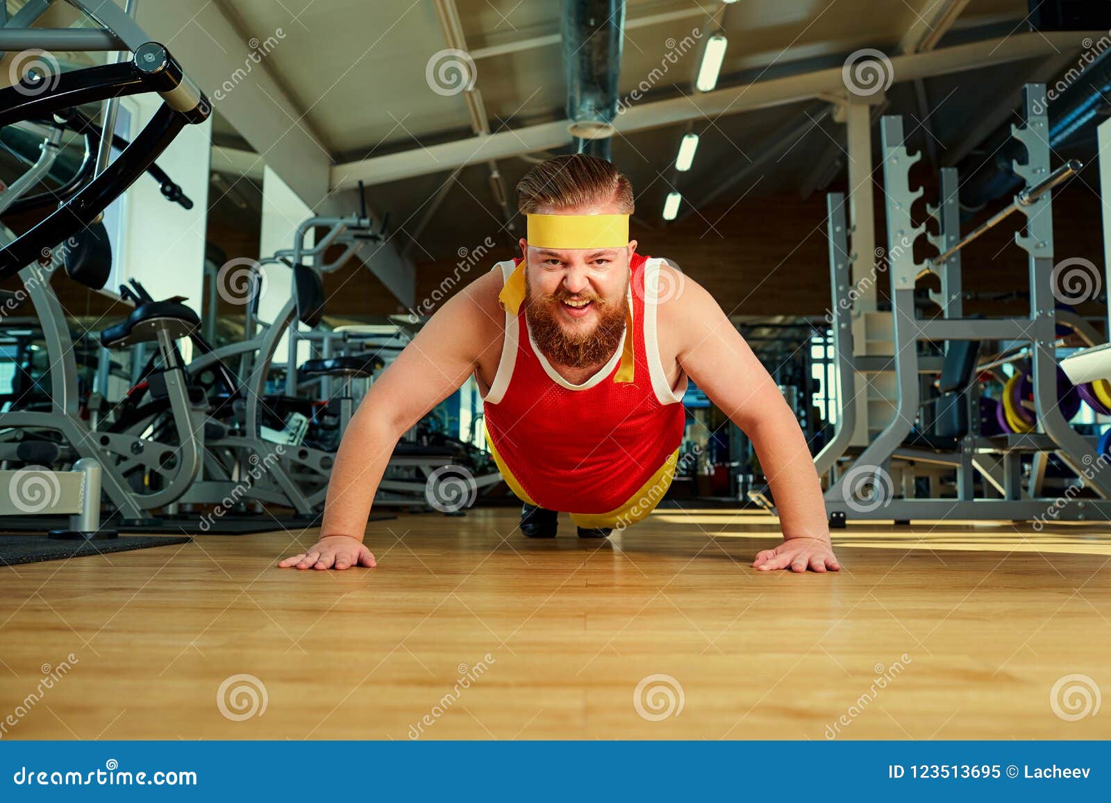 A Funny Fat Man with a Beard in the Gym Stock Image - Image of adult ...