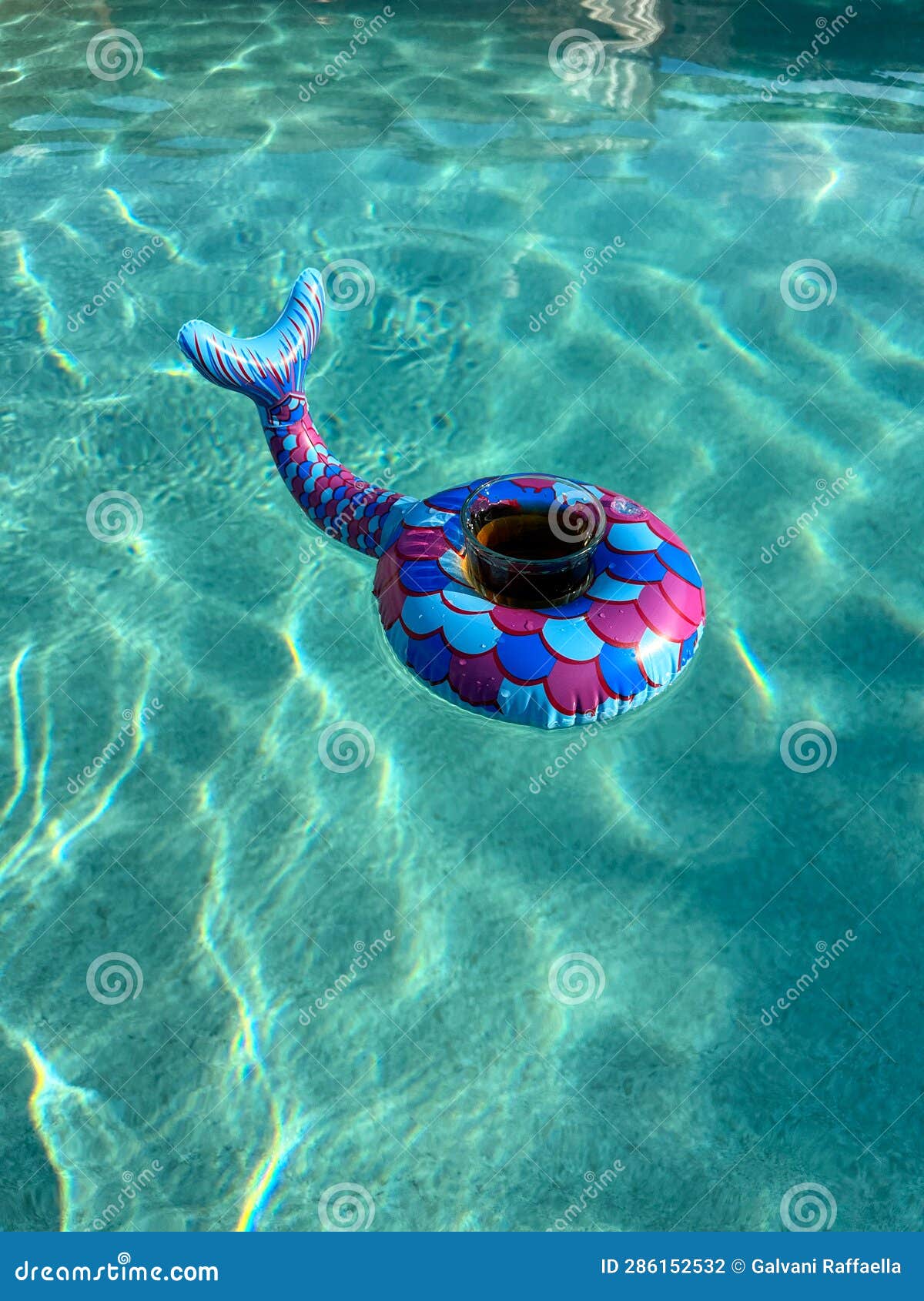 Funny Floating Inflatable with Drink on a Pool Water Stock Photo ...