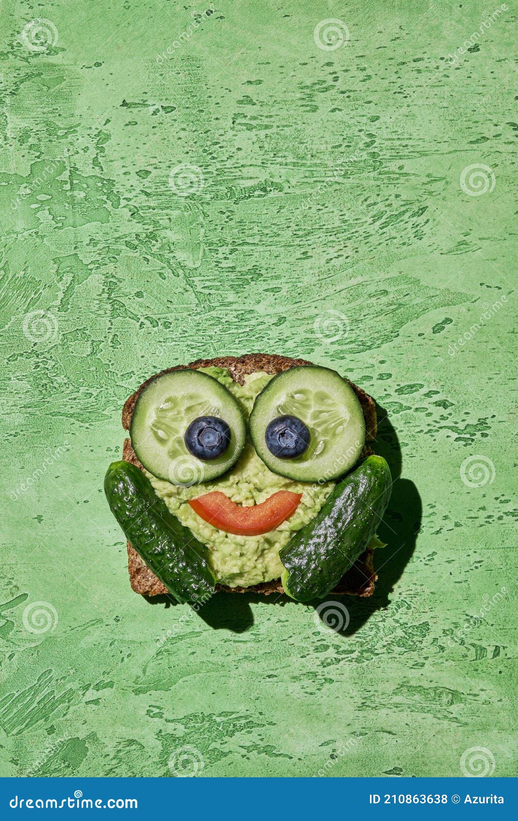 Frog Toast with Avocado stock photo. Image of funny - 210863638