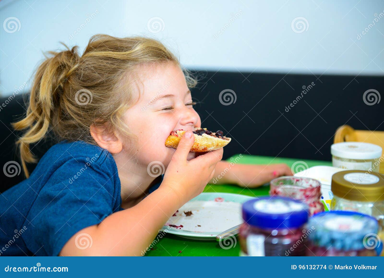 Funny Girl Eating Bread Roll with Marmelade Stock Photo - Image of ...