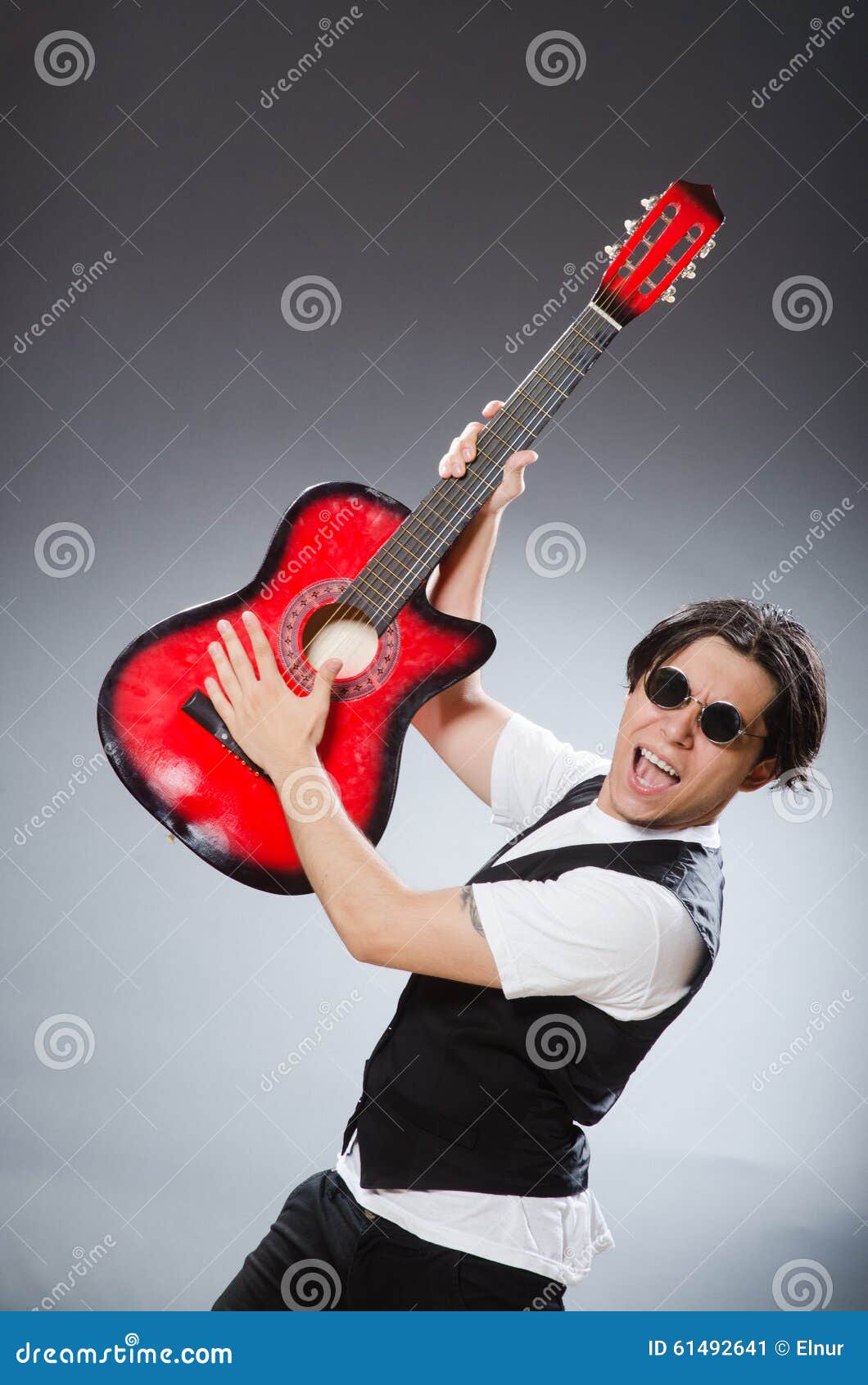 The Funny Guitar Player in Musical Concept Stock Image - Image of party ...