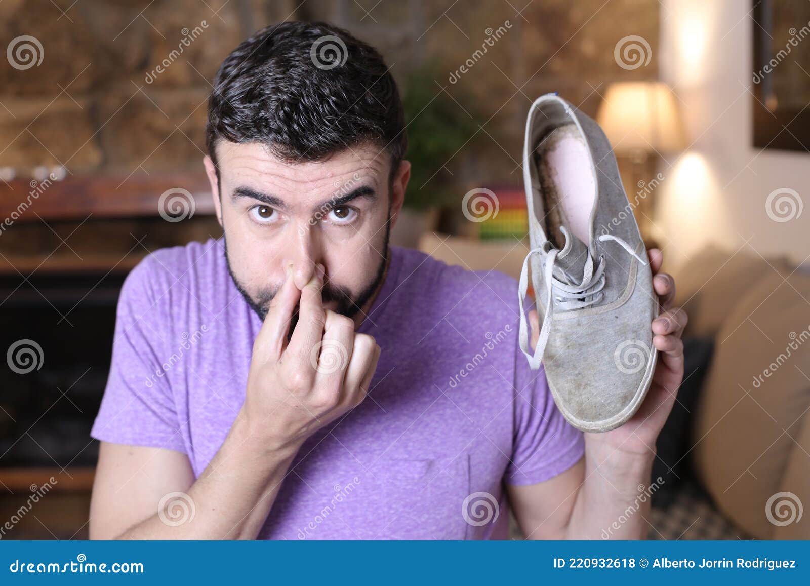 Funny Guy Smelling Shoe with Fungus Stock Photo - Image of lifestyle ...