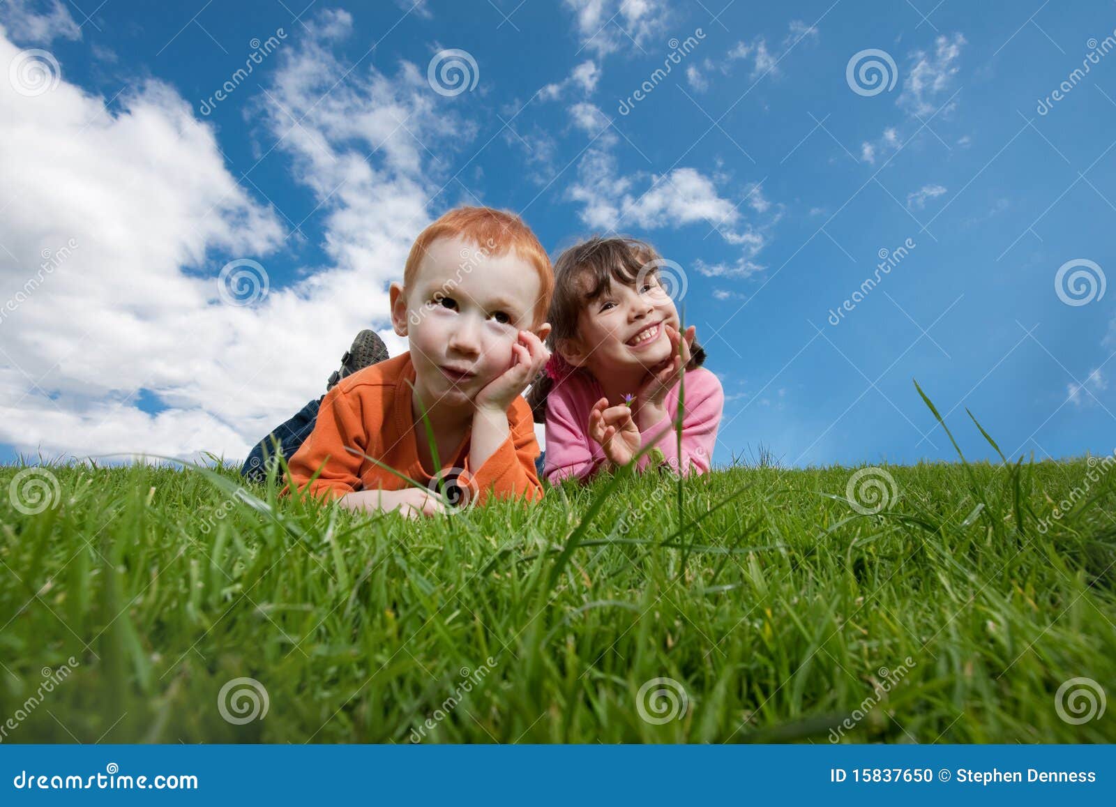 Two Kids Lying On The Meadow In The Park Stock Image | CartoonDealer ...
