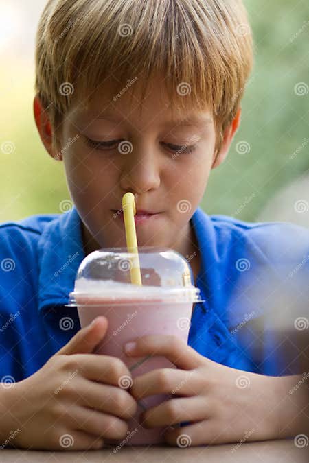 Funny Little Boy Drinks Milkshake Stock Image - Image of child, small ...