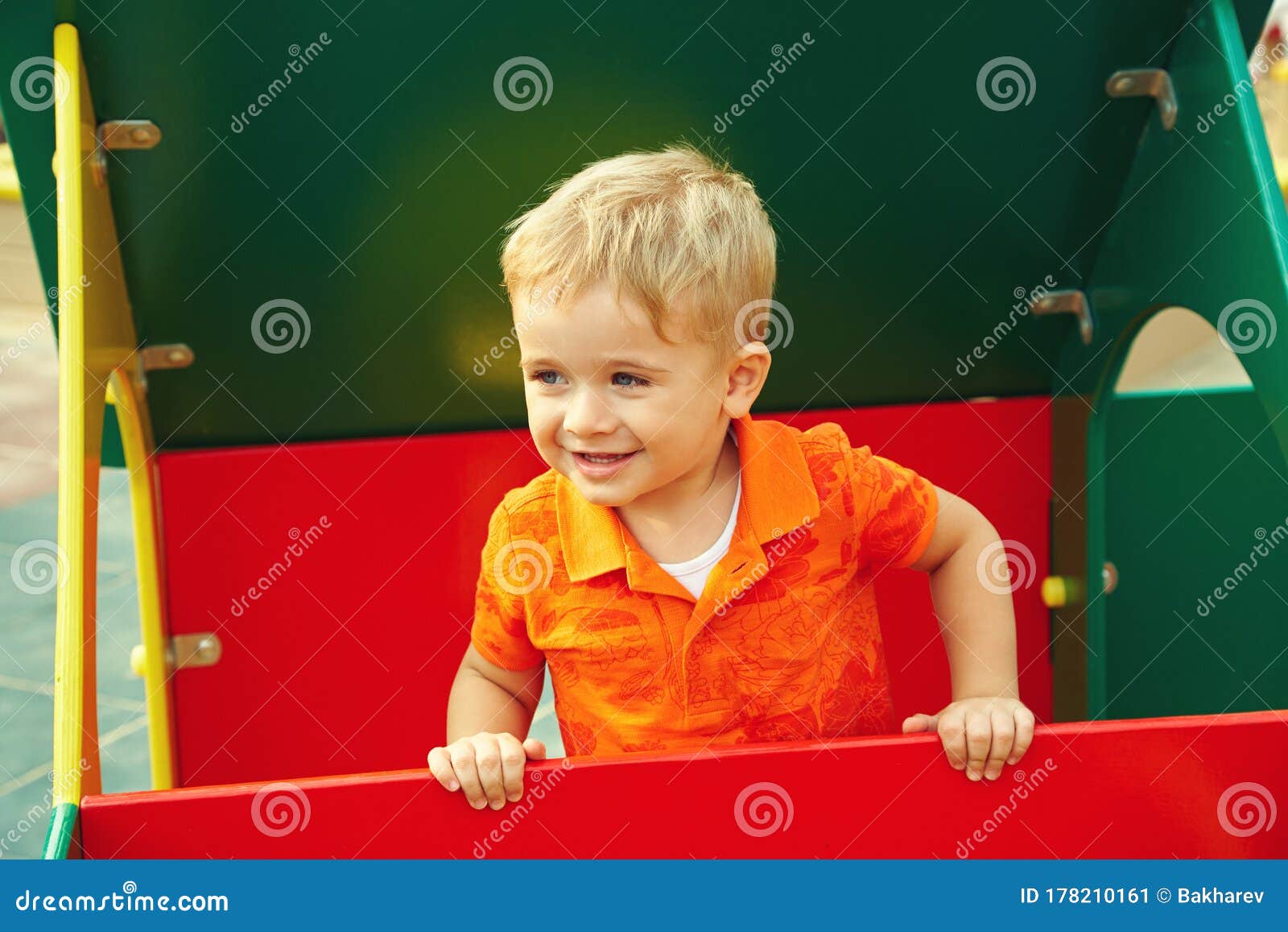 Funny Little Boy on Playground. Playing Child. Stock Image - Image of ...