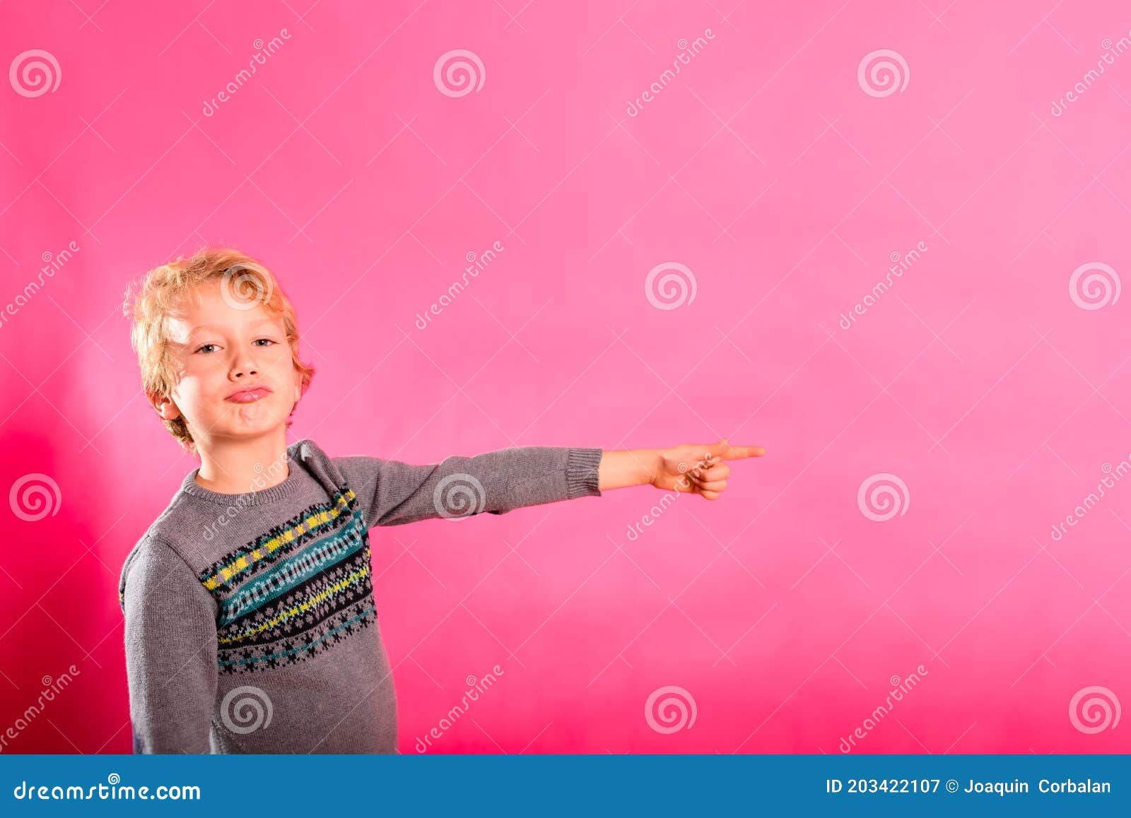 Funny Little Boy Points His Finger Forward while Laughing, Isolating on ...