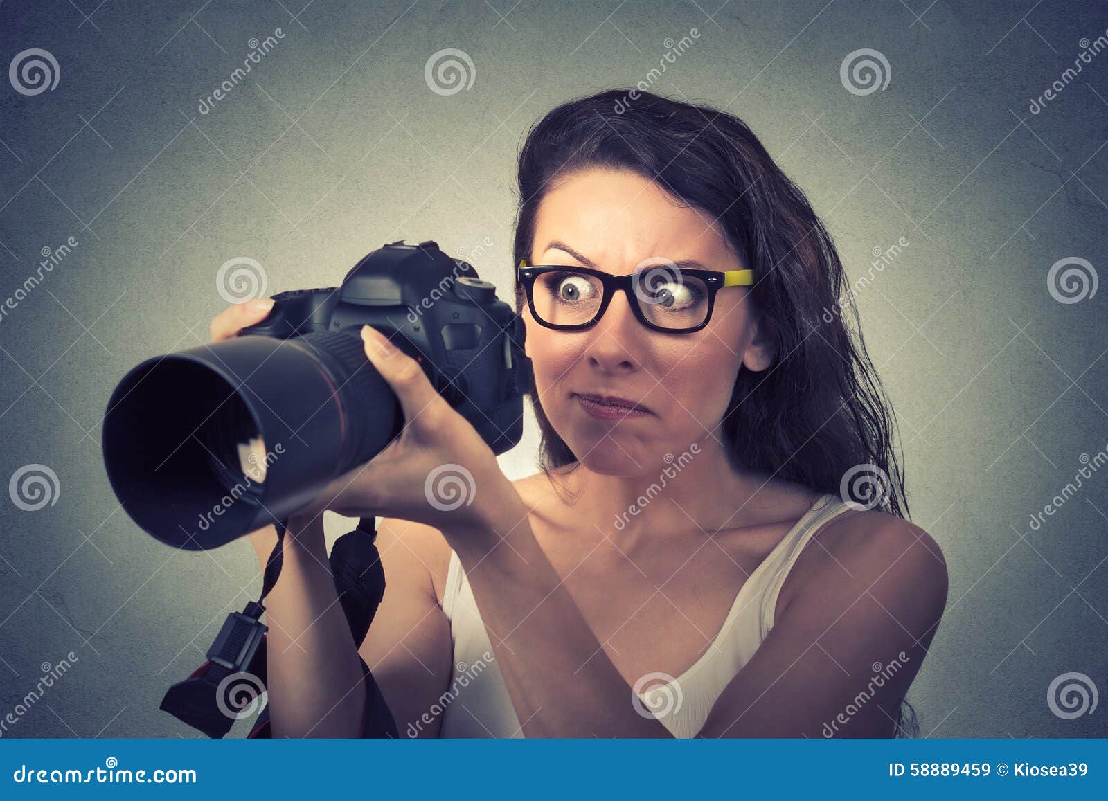 Funny Looking Young Woman with Digital Camera Stock Image - Image of ...