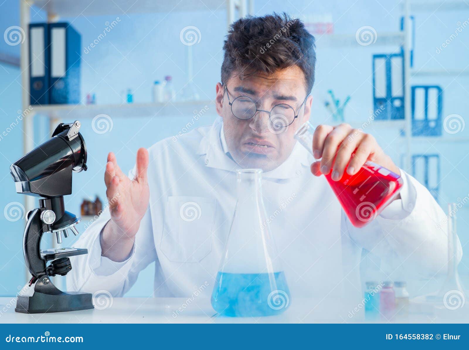 Funny Mad Chemist Working in a Laboratory Stock Photo - Image of ...