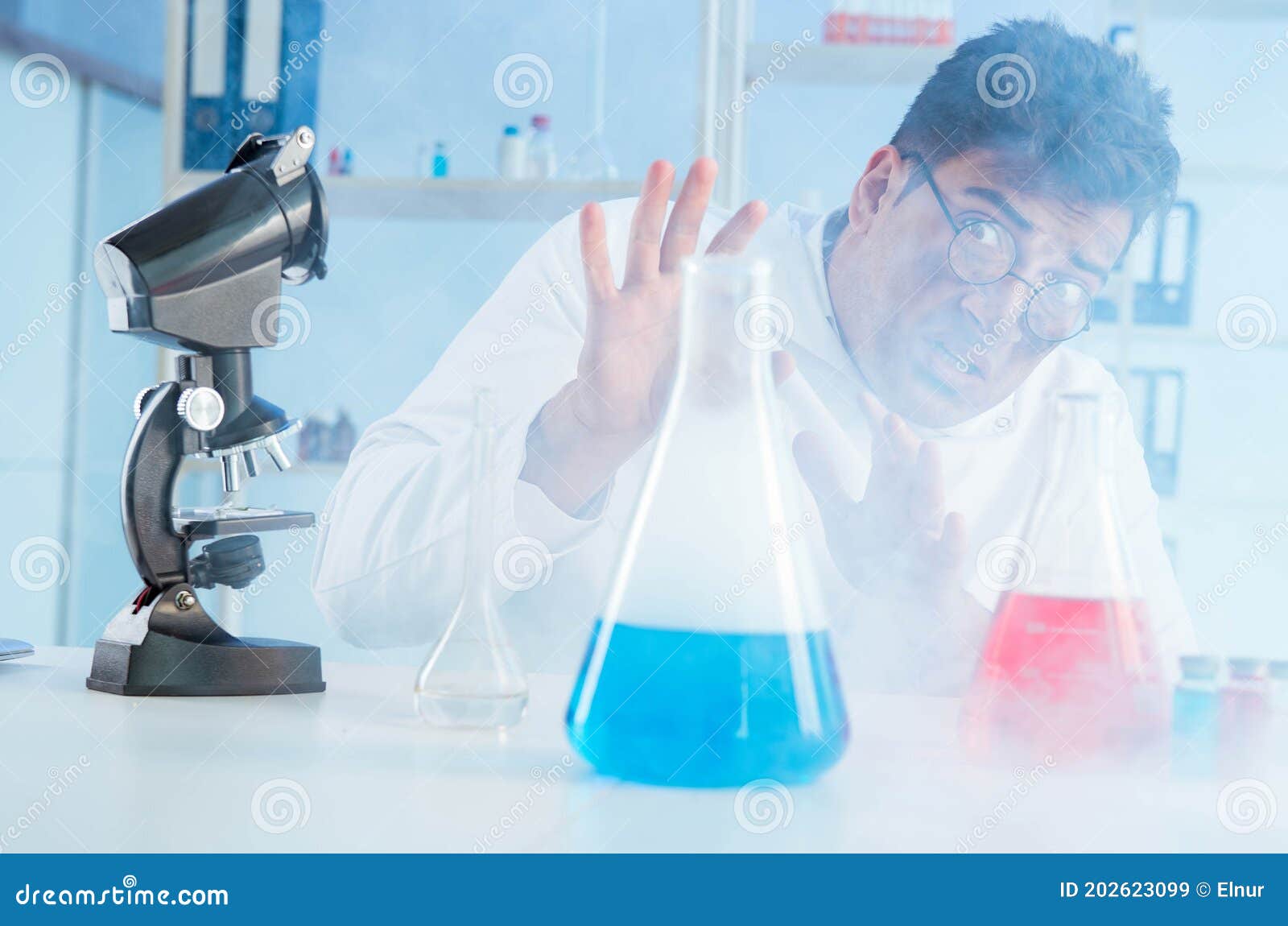 Funny Mad Chemist Working in a Laboratory Stock Image - Image of ...