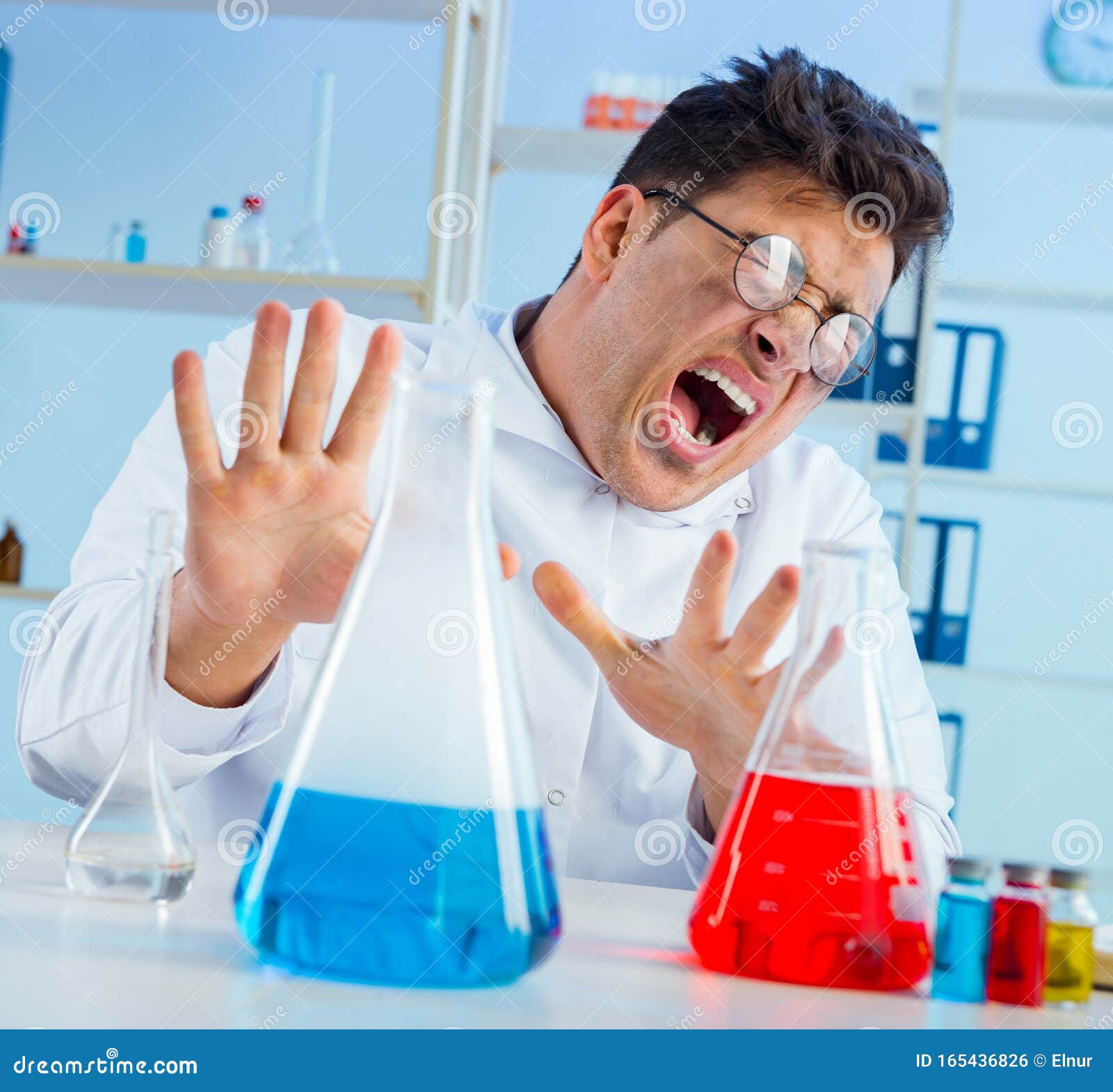 Funny Mad Chemist Working in a Laboratory Stock Photo - Image of mixing ...