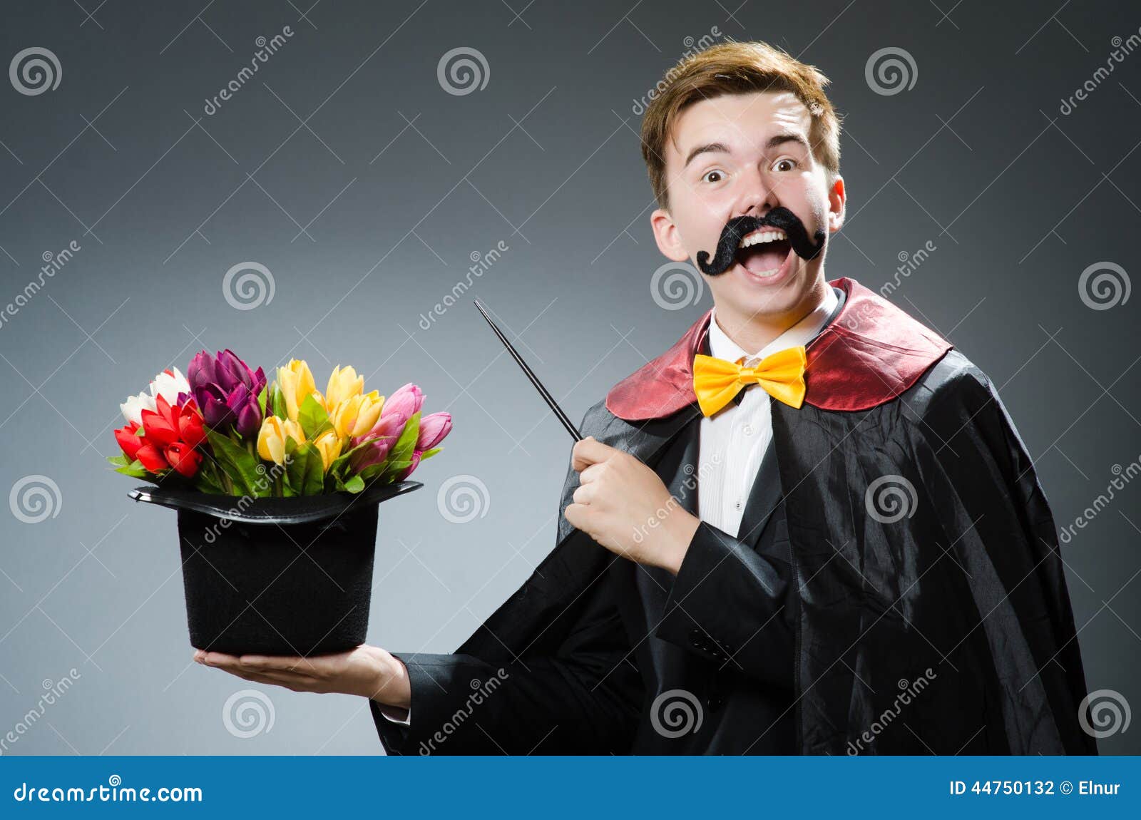 Funny magician with wand stock photo. Image of black - 44750132