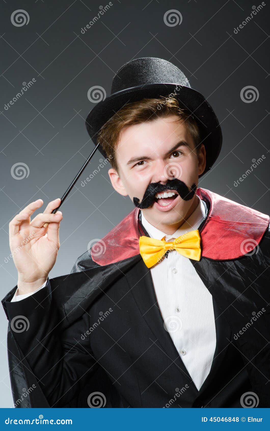 Funny magician with wand stock photo. Image of entertainment - 45046848