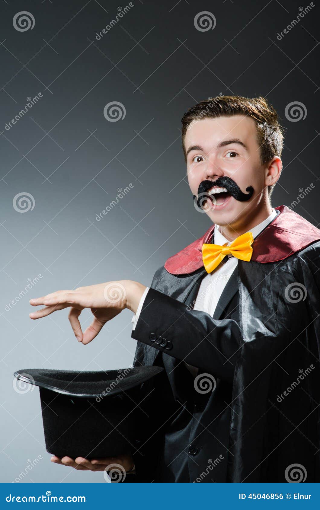 Funny magician with wand stock photo. Image of glove - 45046856