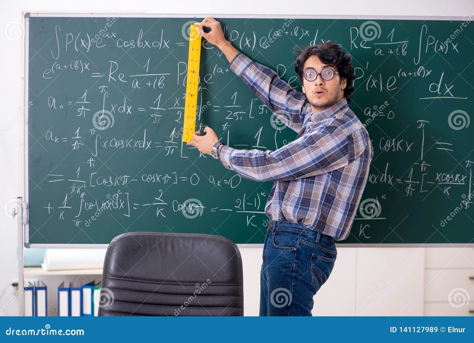 The Funny Male Math Teacher in the Classroom Stock Image - Image of ...