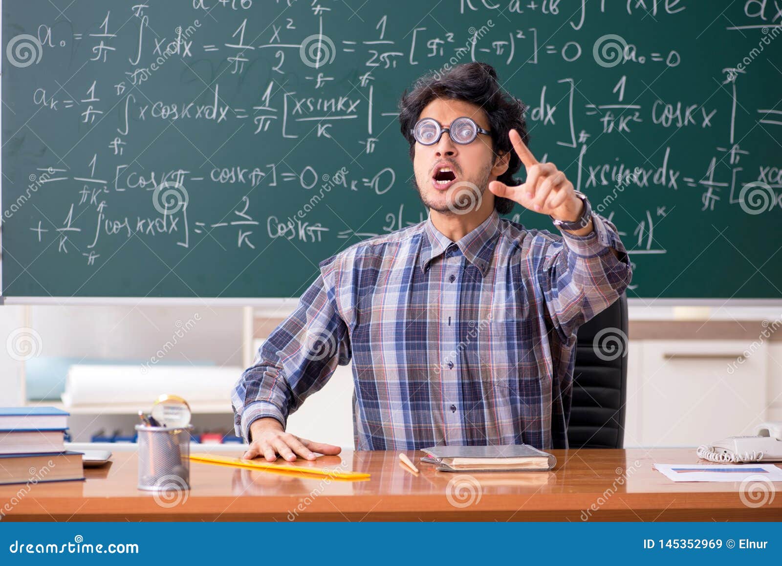 The Funny Male Math Teacher in the Classroom Stock Image - Image of ...