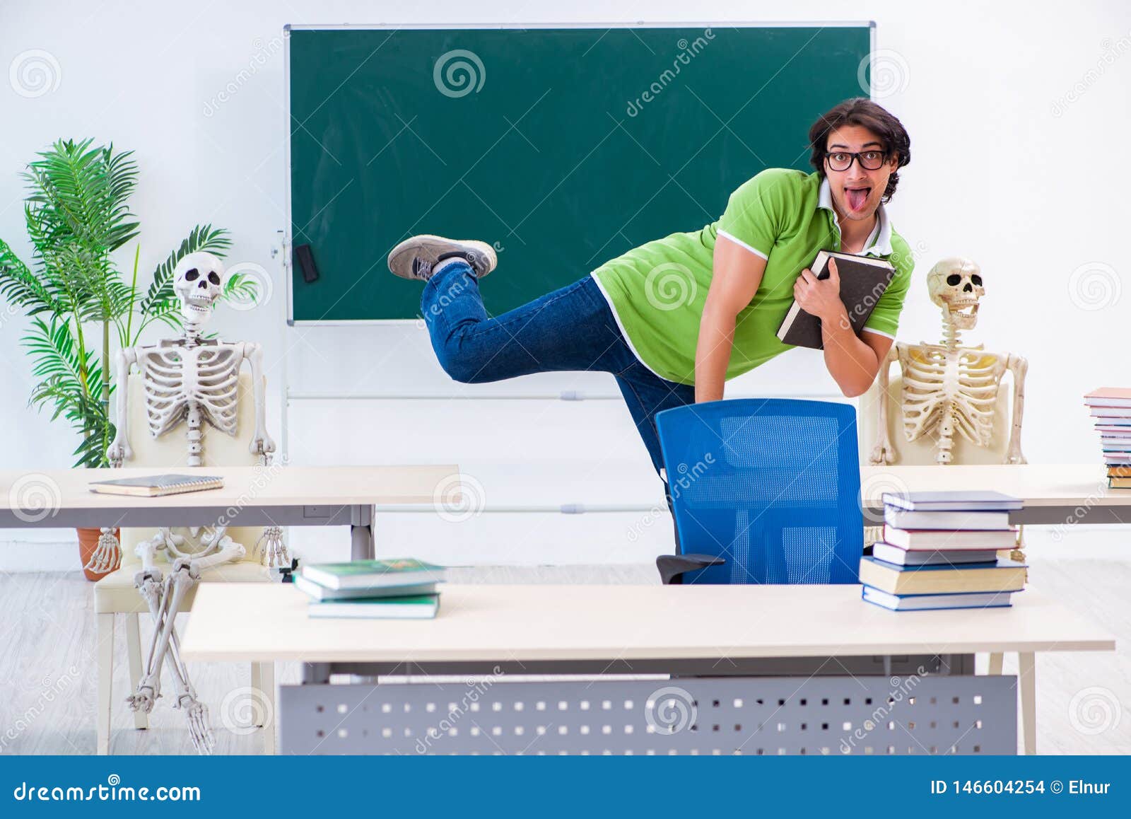 The Funny Male Student in the Classroom with Skeleton Stock Photo ...