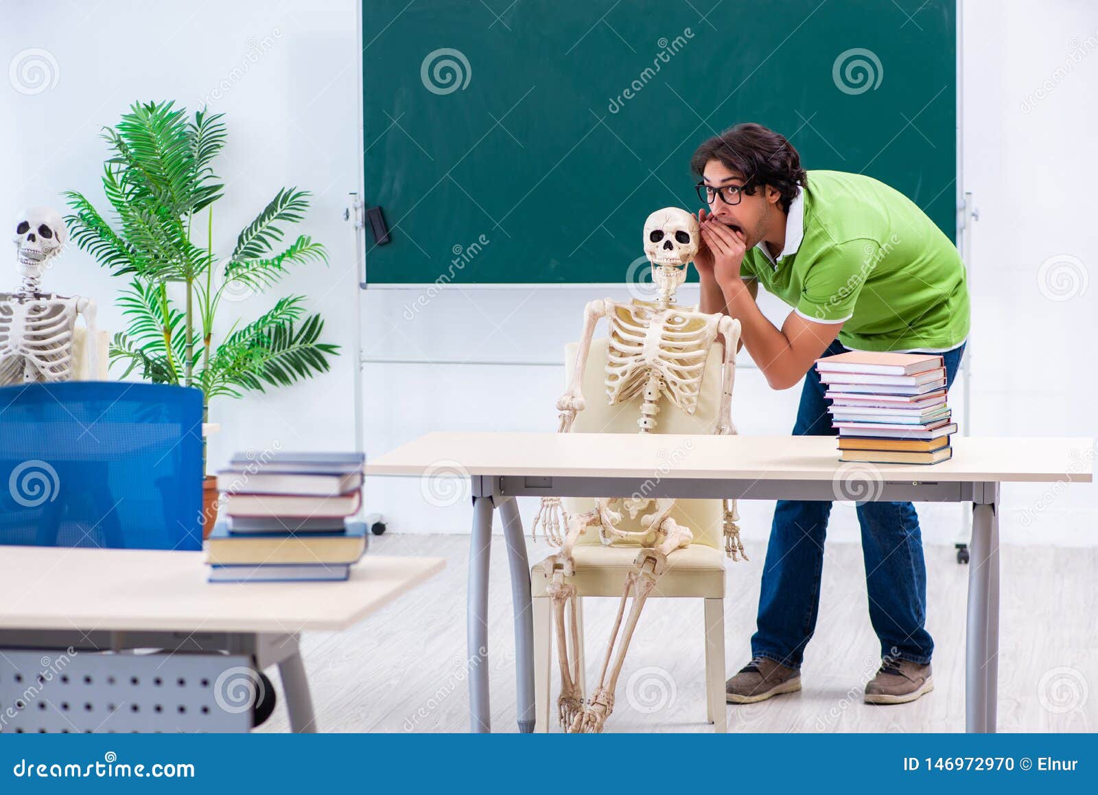 The Funny Male Student in the Classroom with Skeleton Stock Photo ...