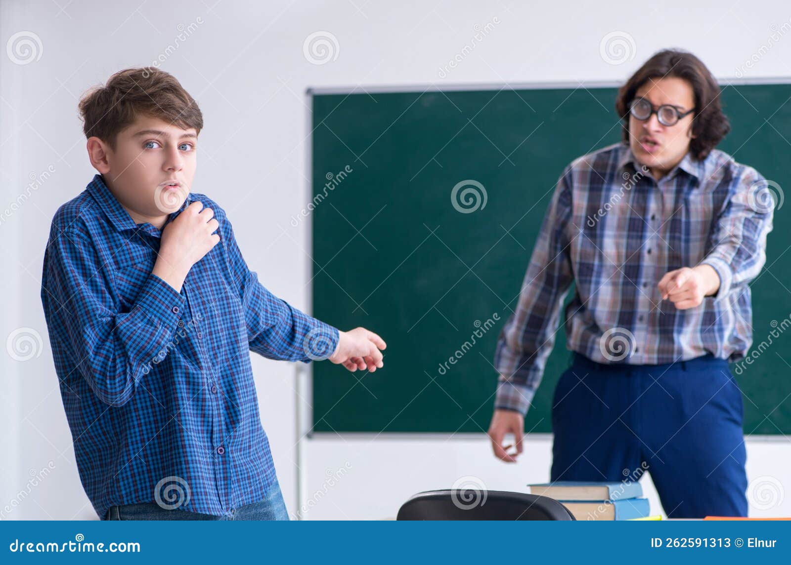 Funny Male Teacher and Boy in the Classroom Stock Image - Image of ...