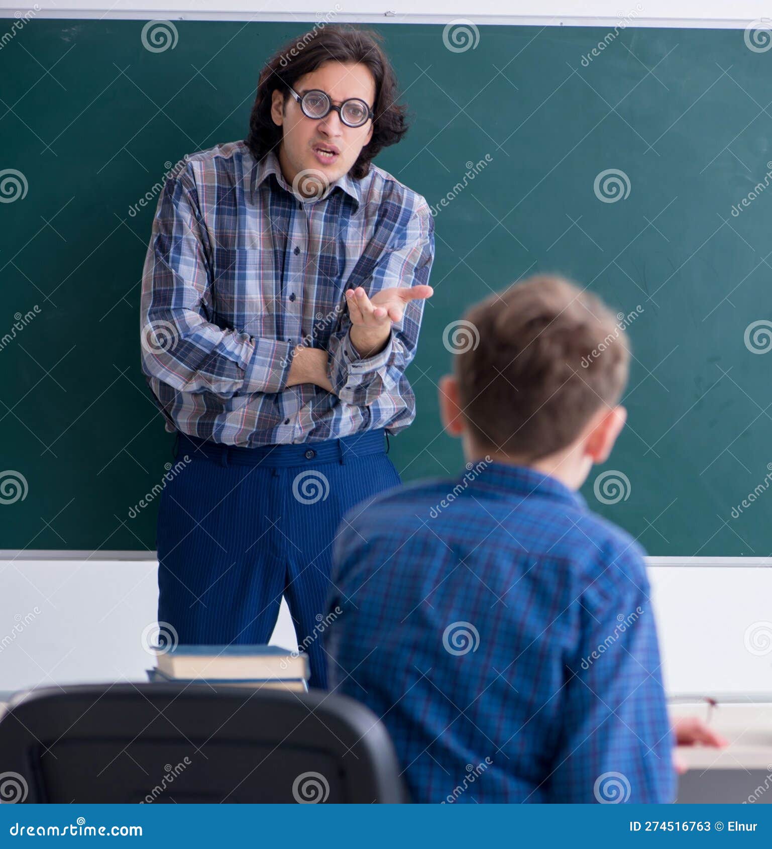 Funny Male Teacher and Boy in the Classroom Stock Image - Image of ...