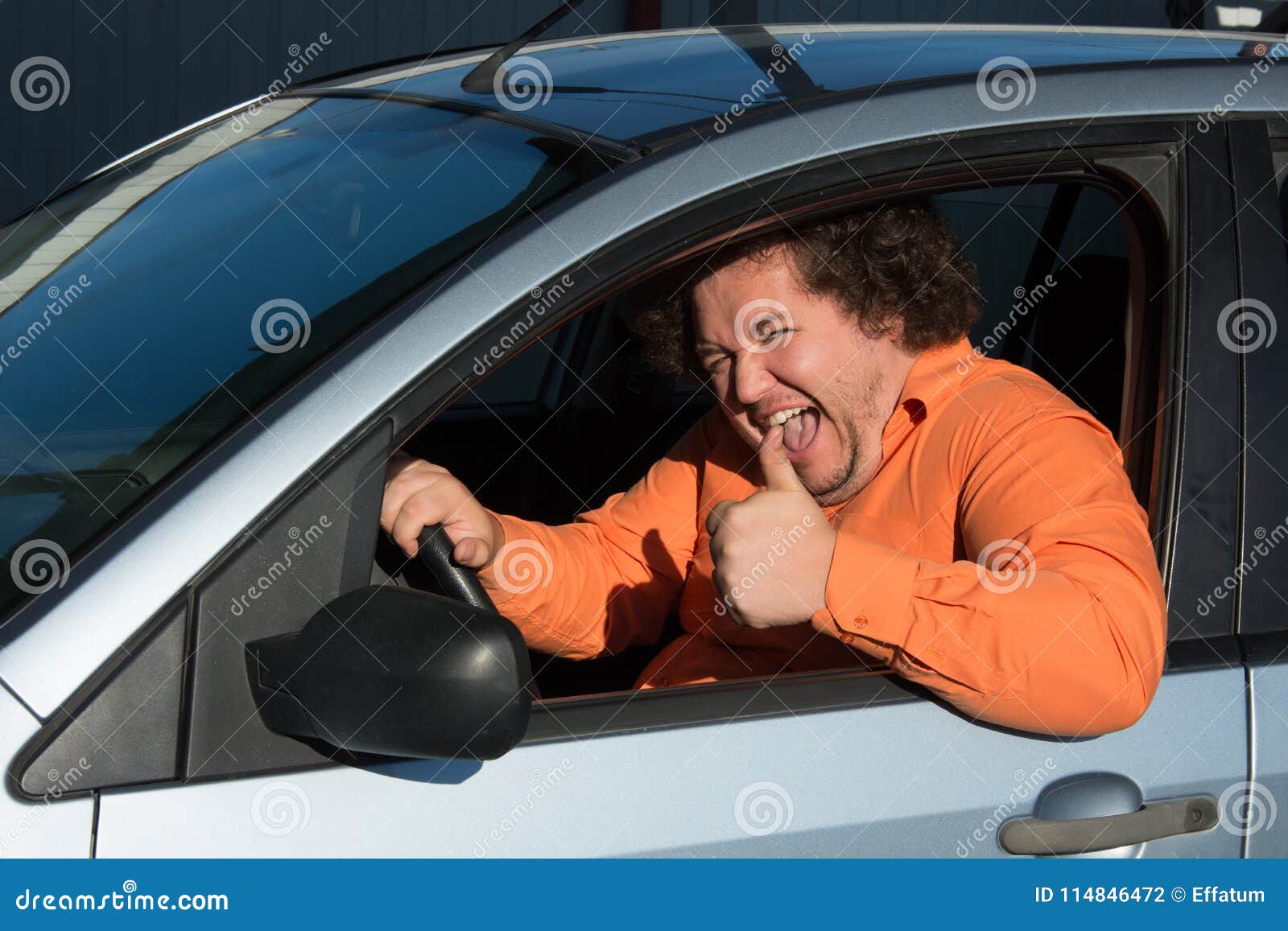 Funny fat man in the car. stock photo. Image of madre - 114846472