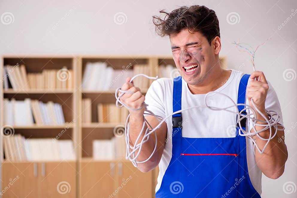The Funny Man Doing Electrical Repairs at Home Stock Photo - Image of ...