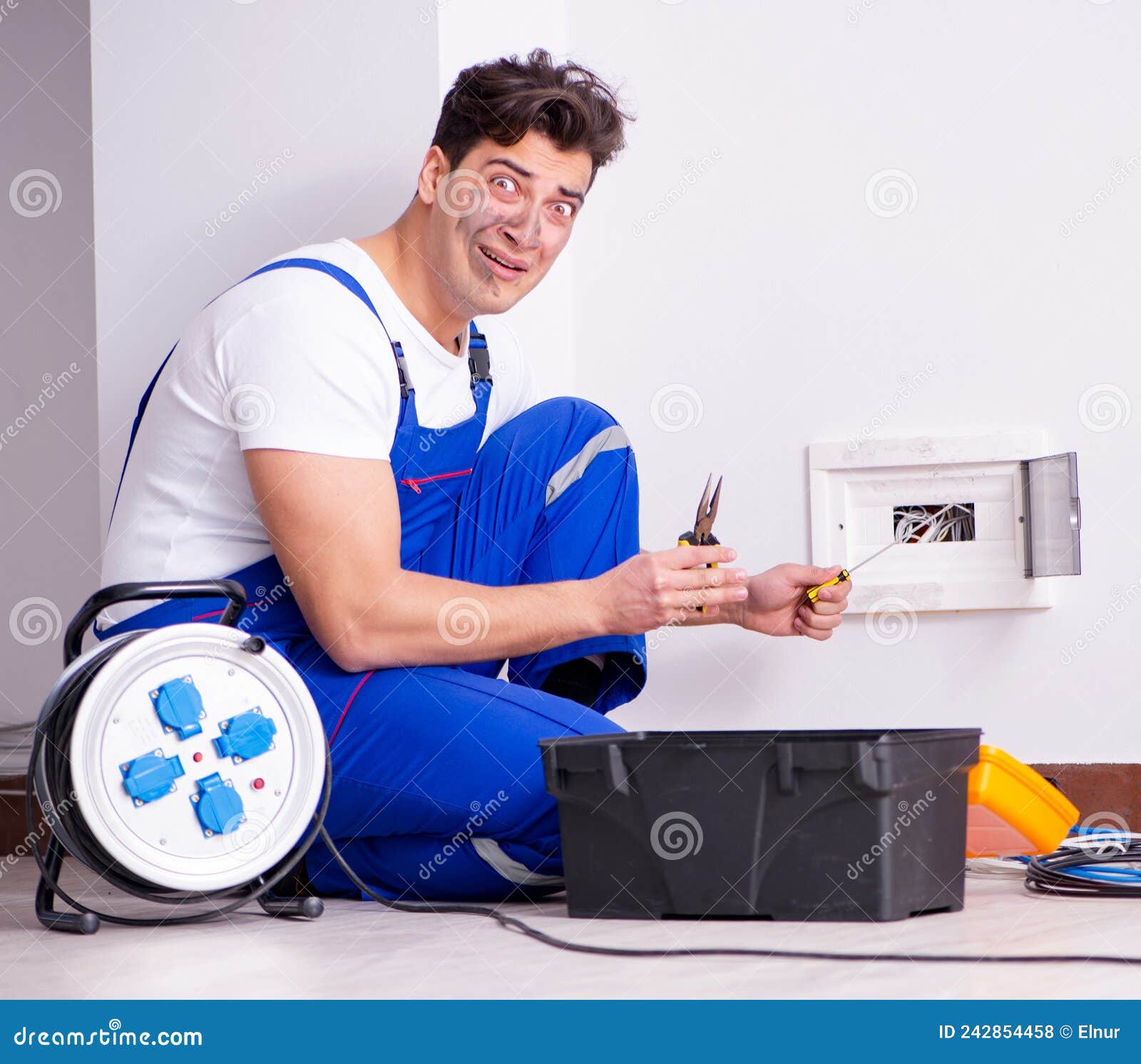 Funny Man Doing Electrical Repairs at Home Stock Photo - Image of ...