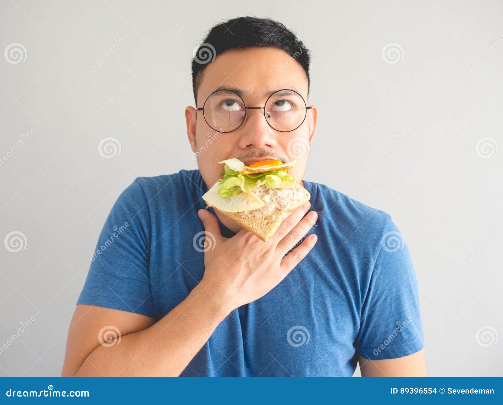 Funny man eat sandwich. stock photo. Image of funny, fast - 89396554