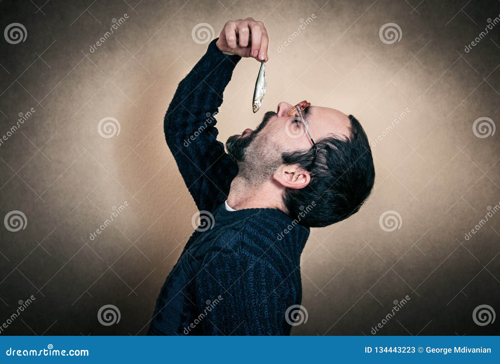 Funny man eating fish stock image. Image of healthy - 134443223