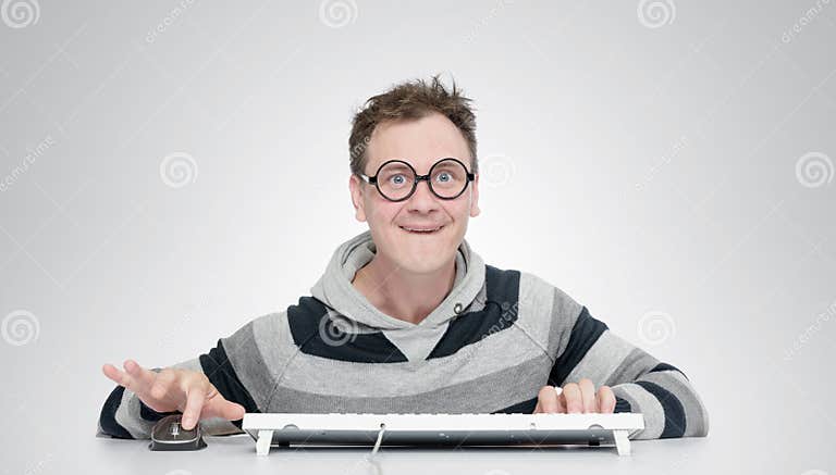 Funny Man in Glasses with a Keyboard in Front of Computer Stock Image ...