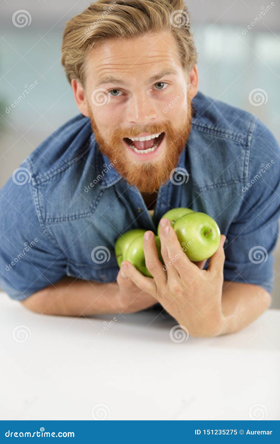 Funny man holding apples stock image. Image of idea - 151235275