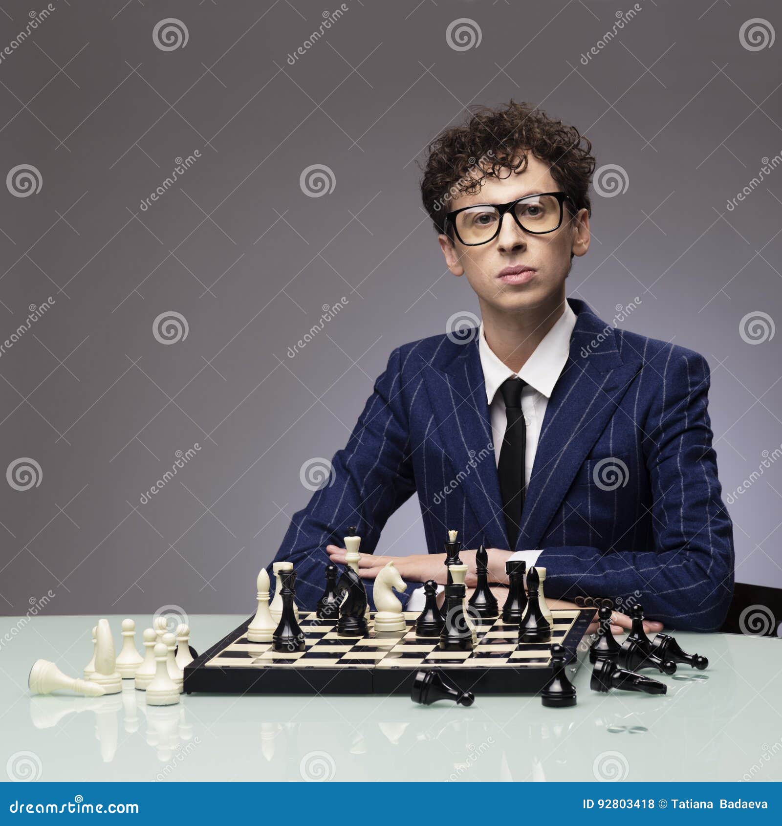 Funny man playing chess stock photo. Image of portrait - 92803418