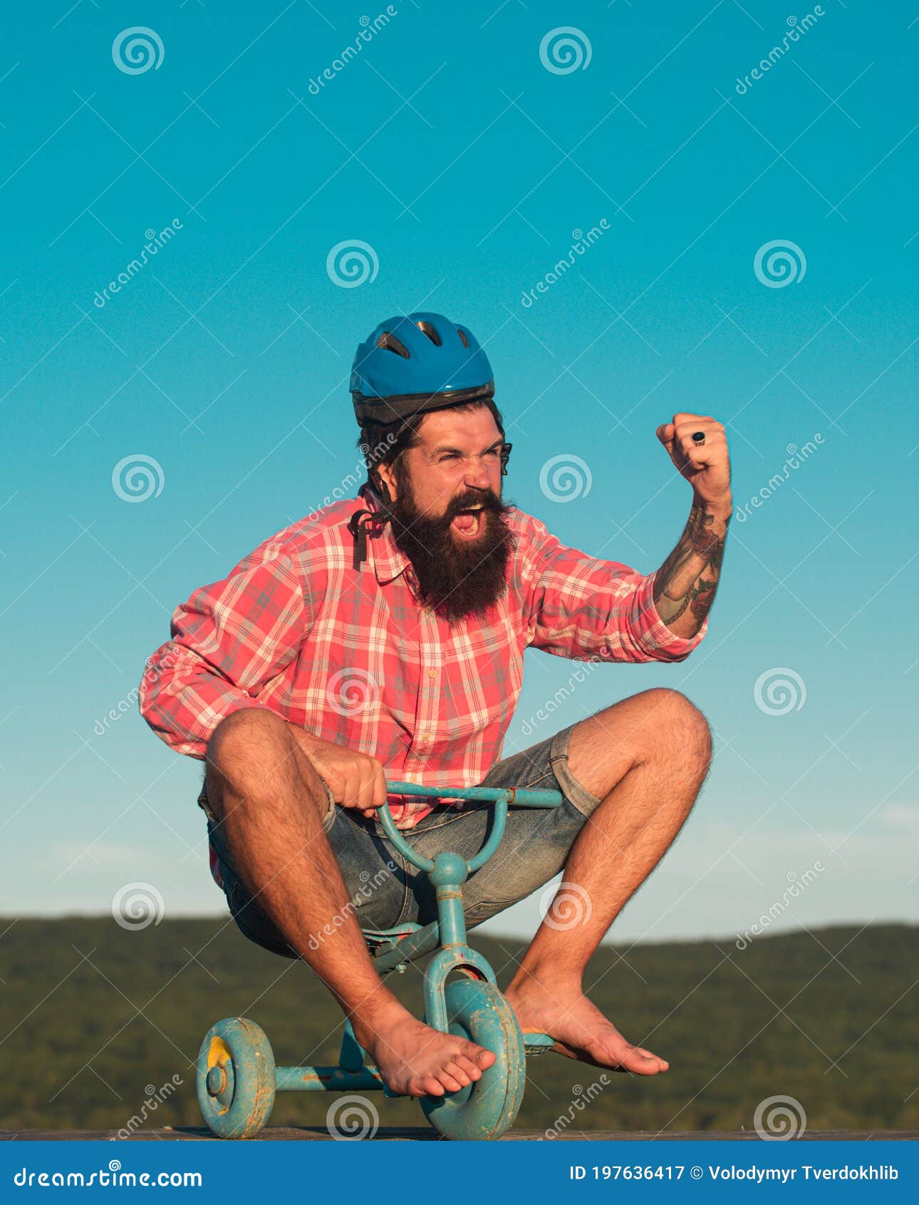 Funny Man Riding a Small Bicycle. Guy Riding Childs Tricycle. Stock ...