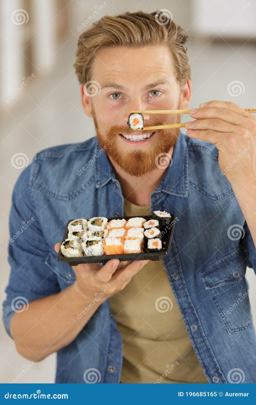Funny man with sushi stock image. Image of people, person - 196685165
