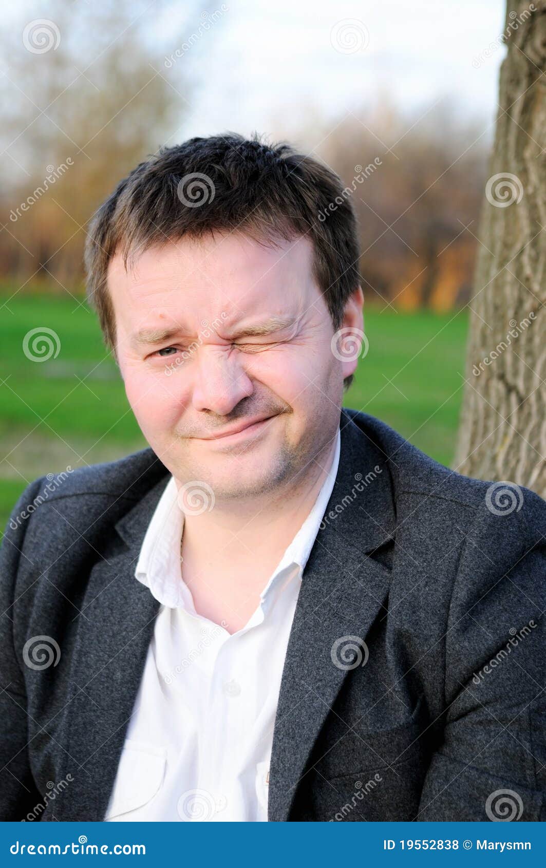 Funny man winking stock photo. Image of curious, happiness - 19552838