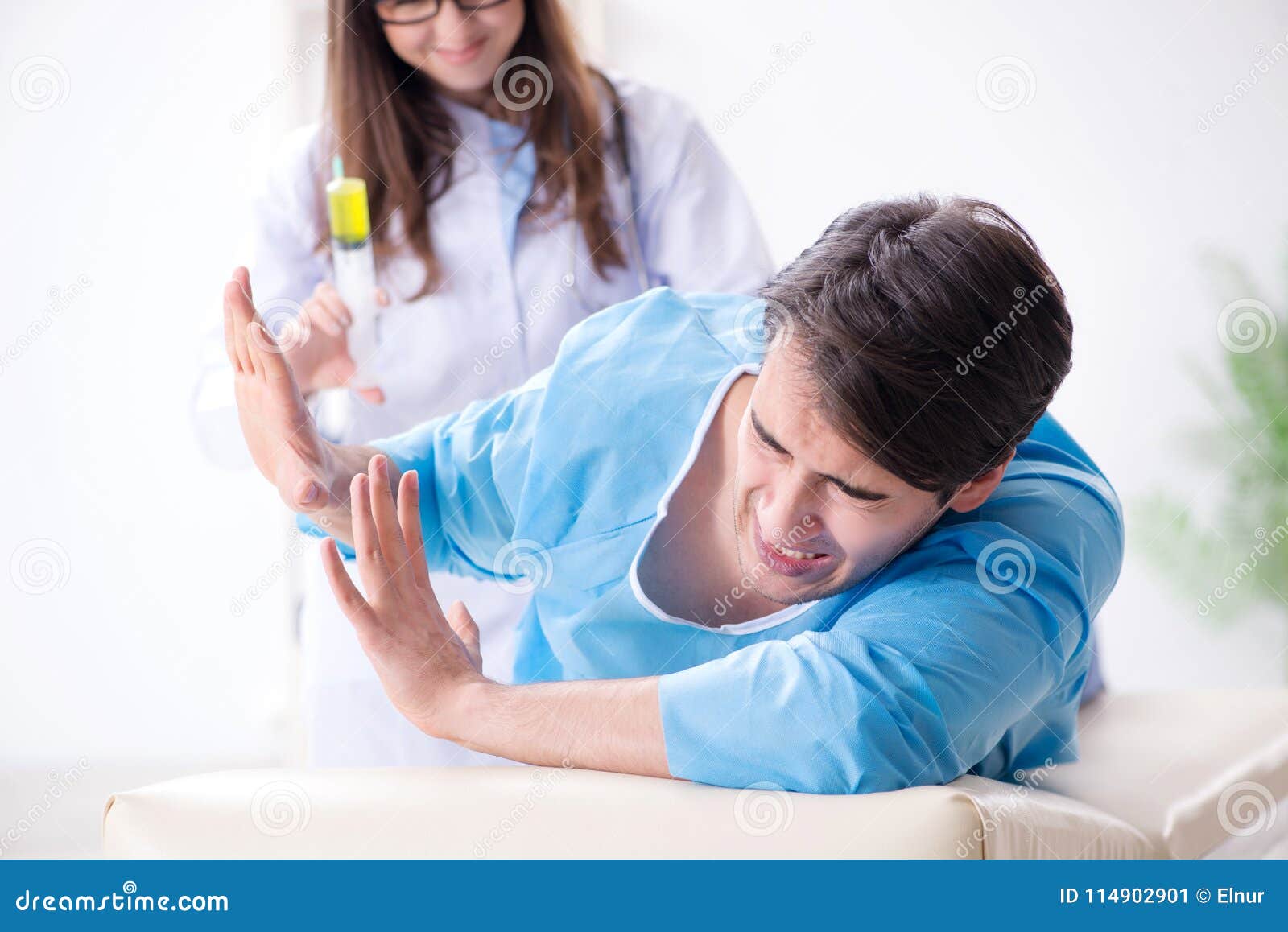The Funny Man Getting Ready for Buttocks Syringe Shot Stock Image ...