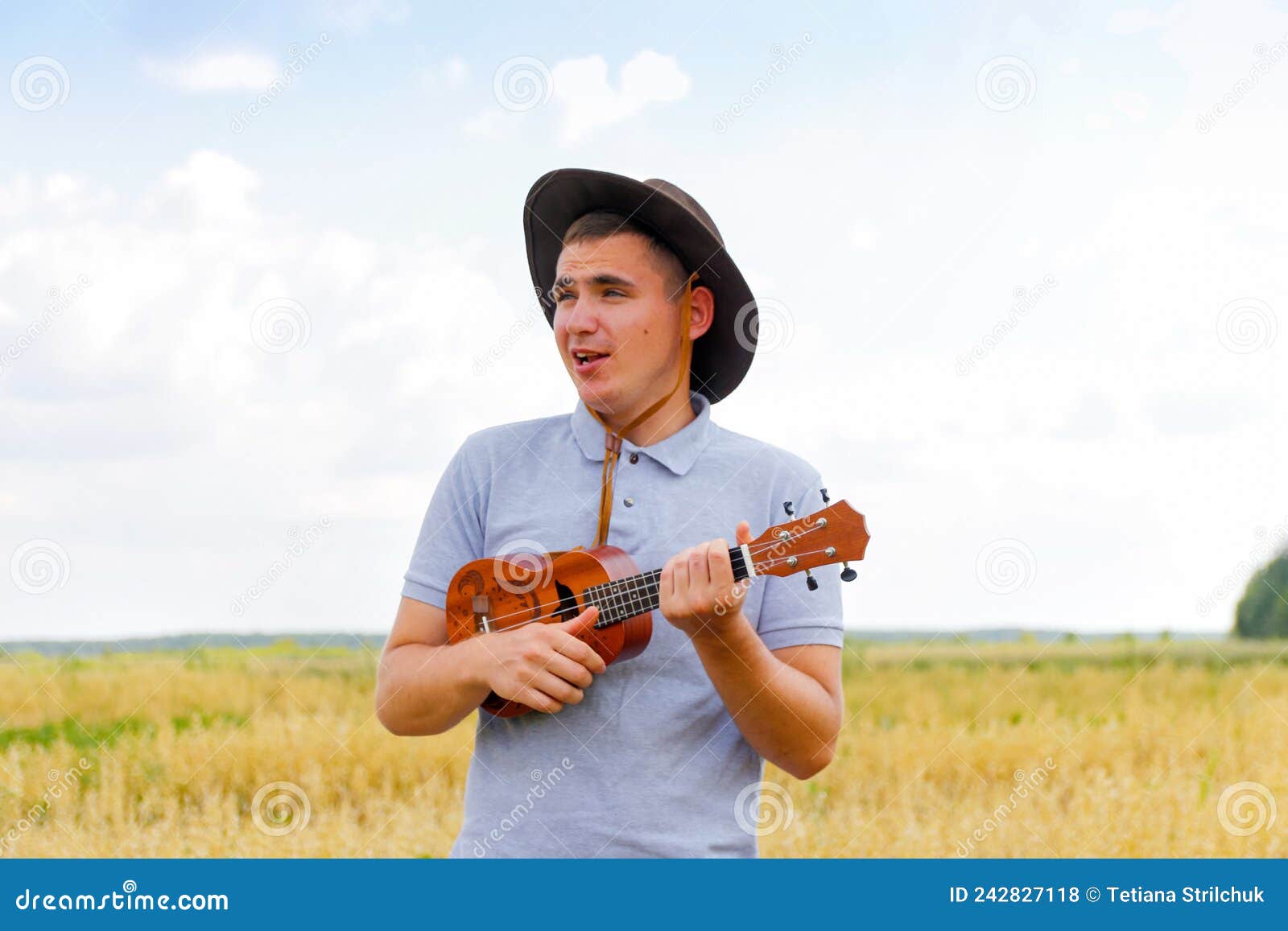 Funny Men Young Beautiful Caucasian Man Playing Ukulele Outside Stock
