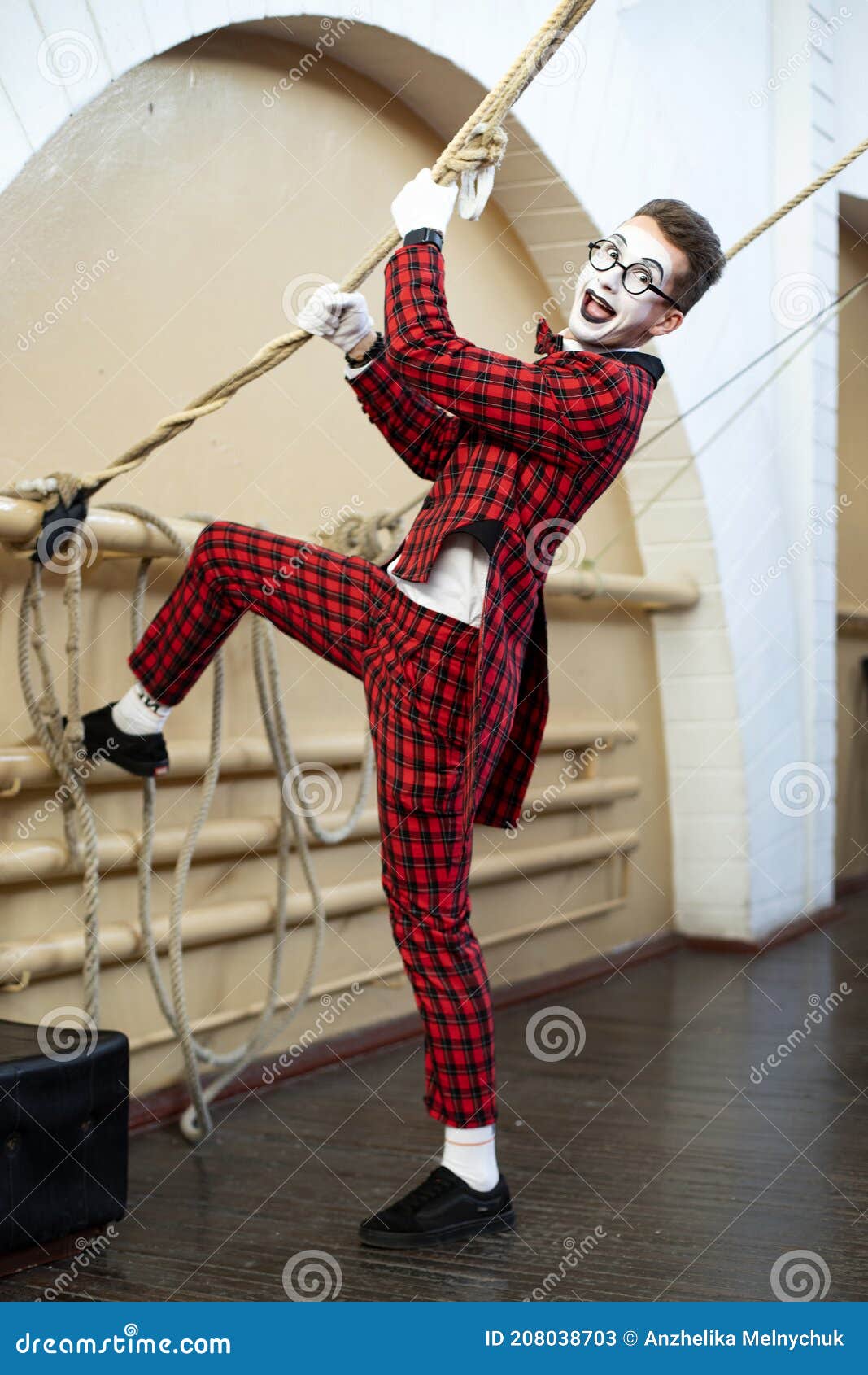 Funny Mime in a Red Suit Pulls a Rope Stock Image - Image of ...