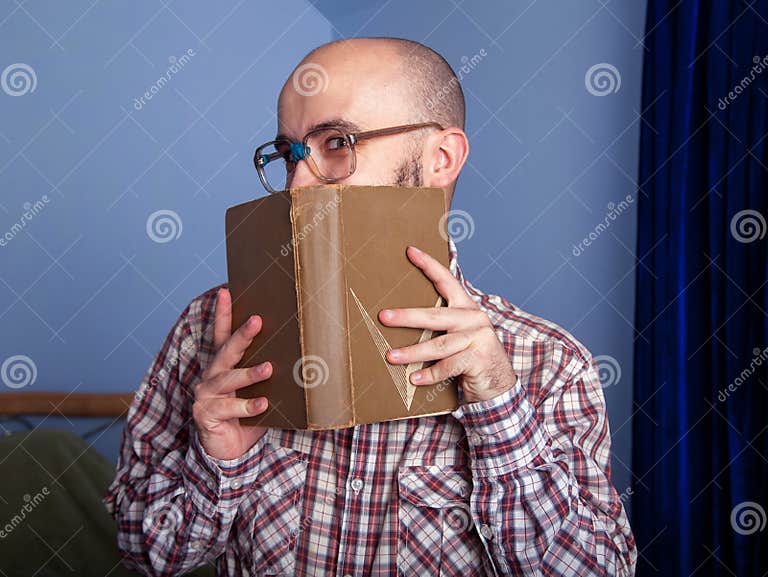 Funny nerd reading a book stock photo. Image of styled - 56388348