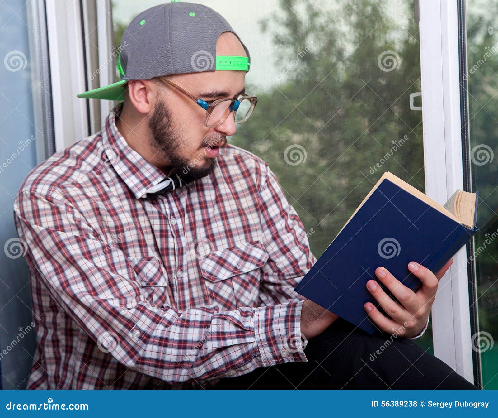 Funny nerd reading a book stock photo. Image of concepts - 56389238
