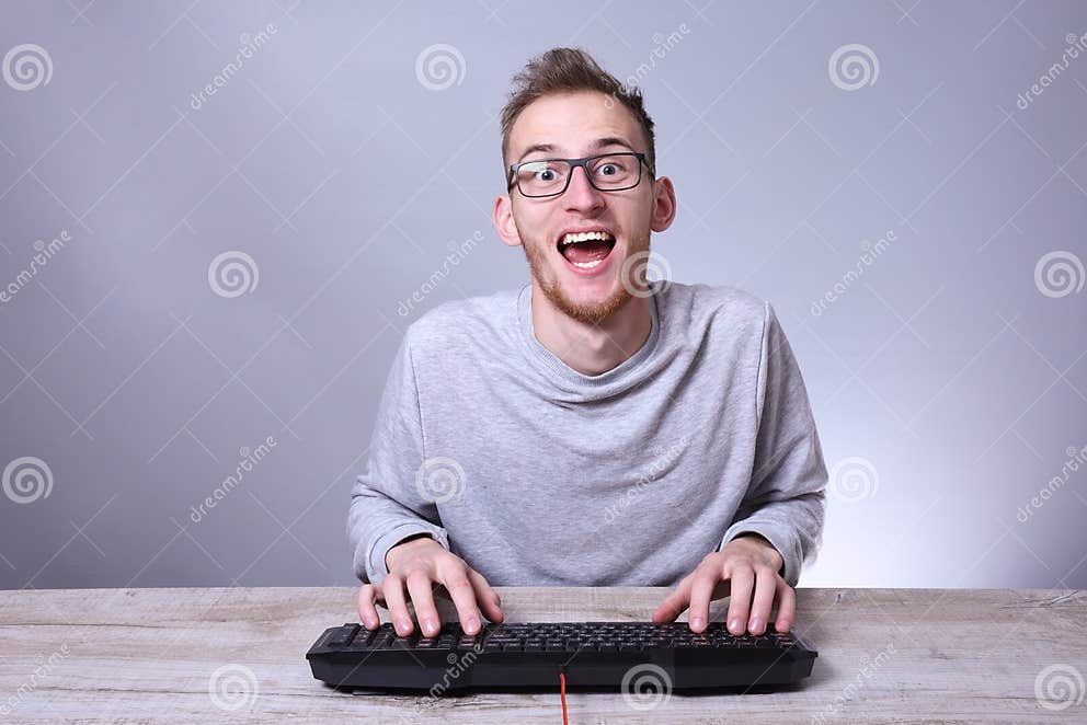 Funny Nerd Young Businessman, Man Working on Computer.Typing on the ...