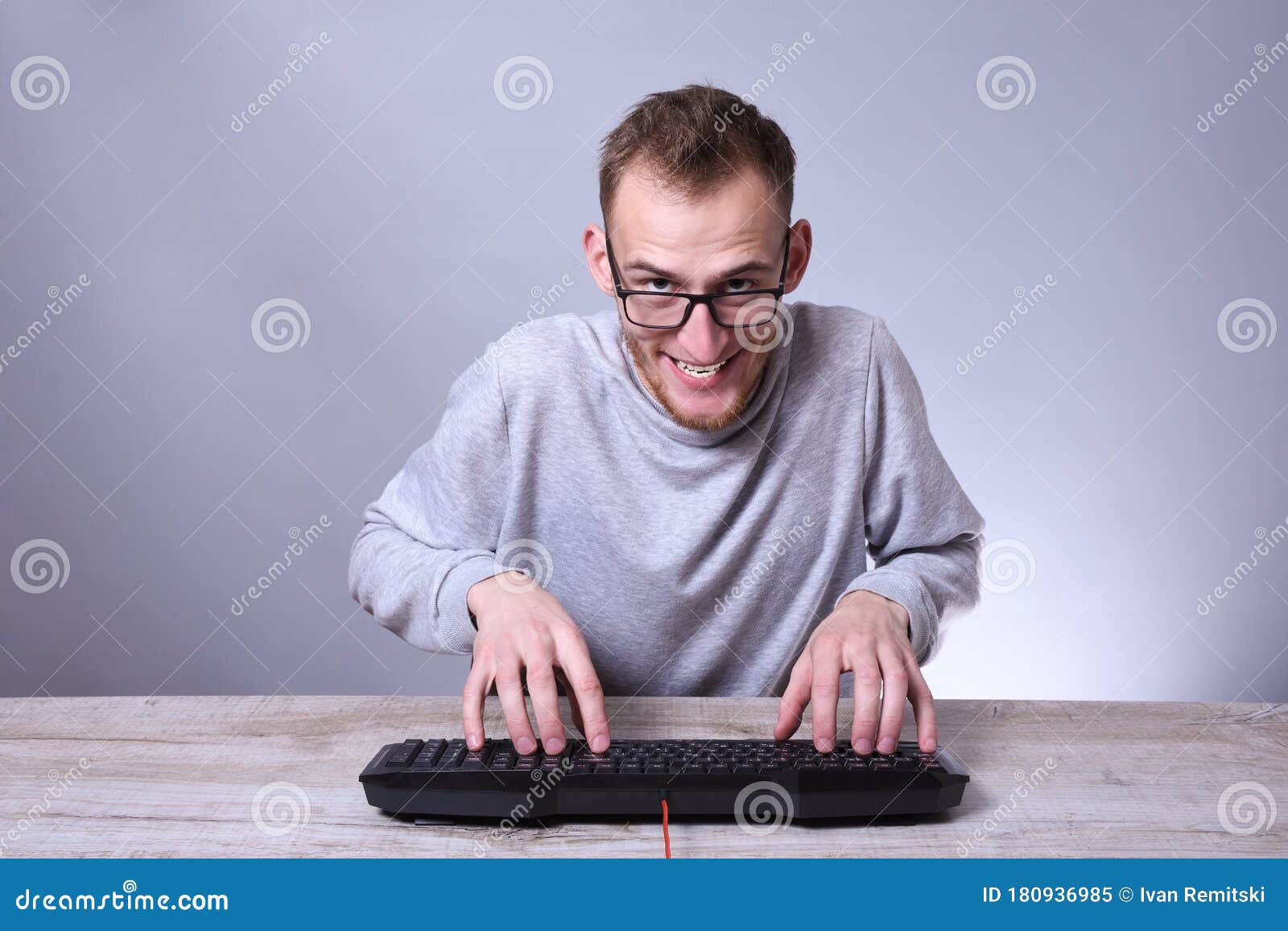 Funny Nerd Young Businessman, Man Working on Computer.Typing on the ...