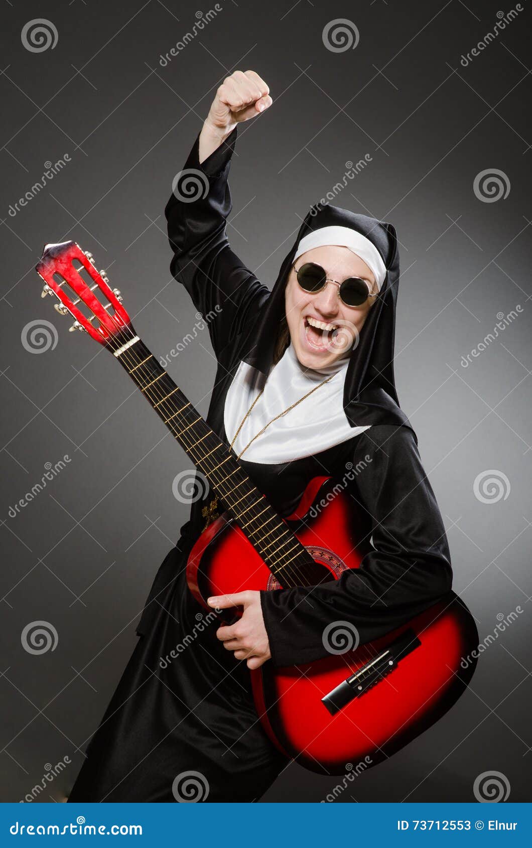 The Funny Nun with Red Guitar Playing Stock Image - Image of ...