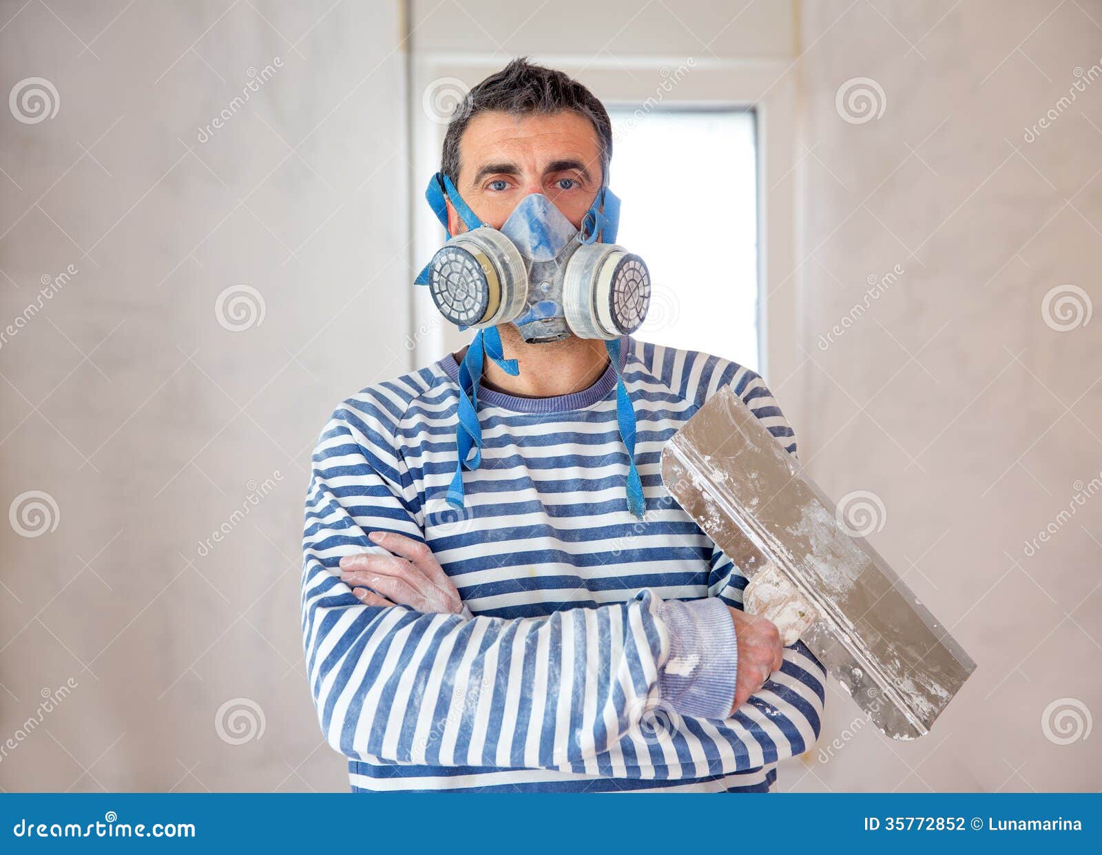 Funny Plastering Man Mason with Protective Mask and Trowel Stock Photo ...