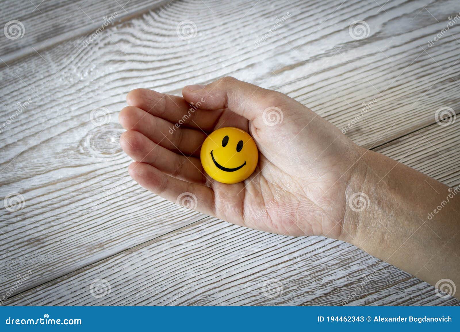 Funny Plastic Smiley Face in a Human Hand. the Concept of a Positive ...