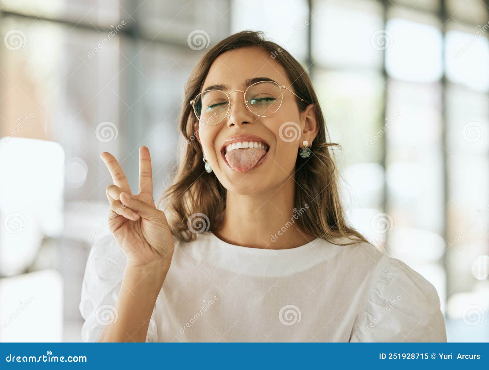 Funny Playful Business Woman Showing Tongue Making Silly Face And