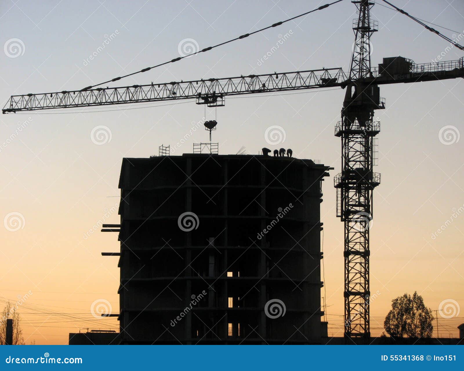 Funny Poses of Builders in the Evening Construction Site Stock Photo ...