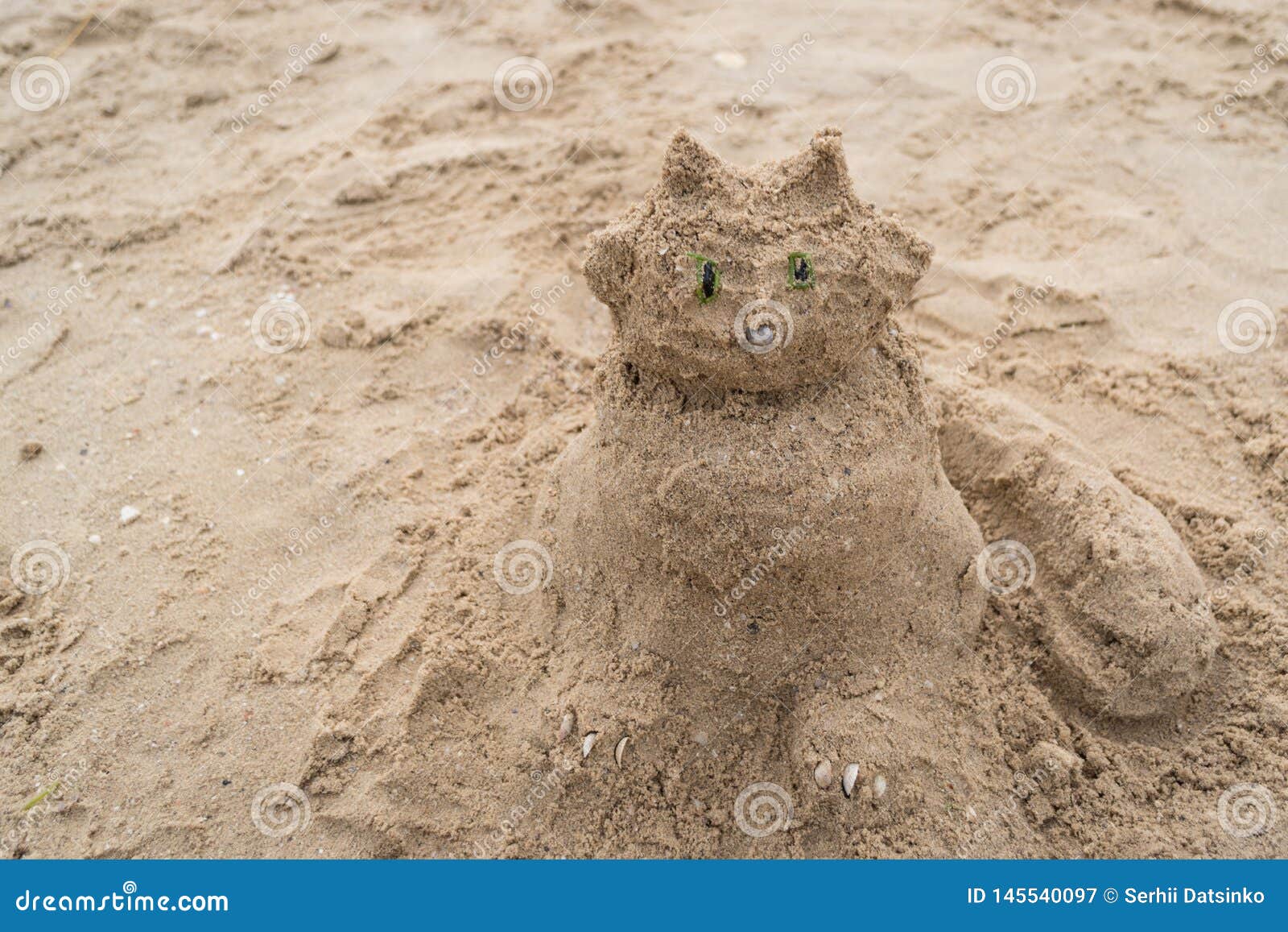 Funny Sand Sculpture of a Cat on the Beach. Summer Holidays Stock Image ...