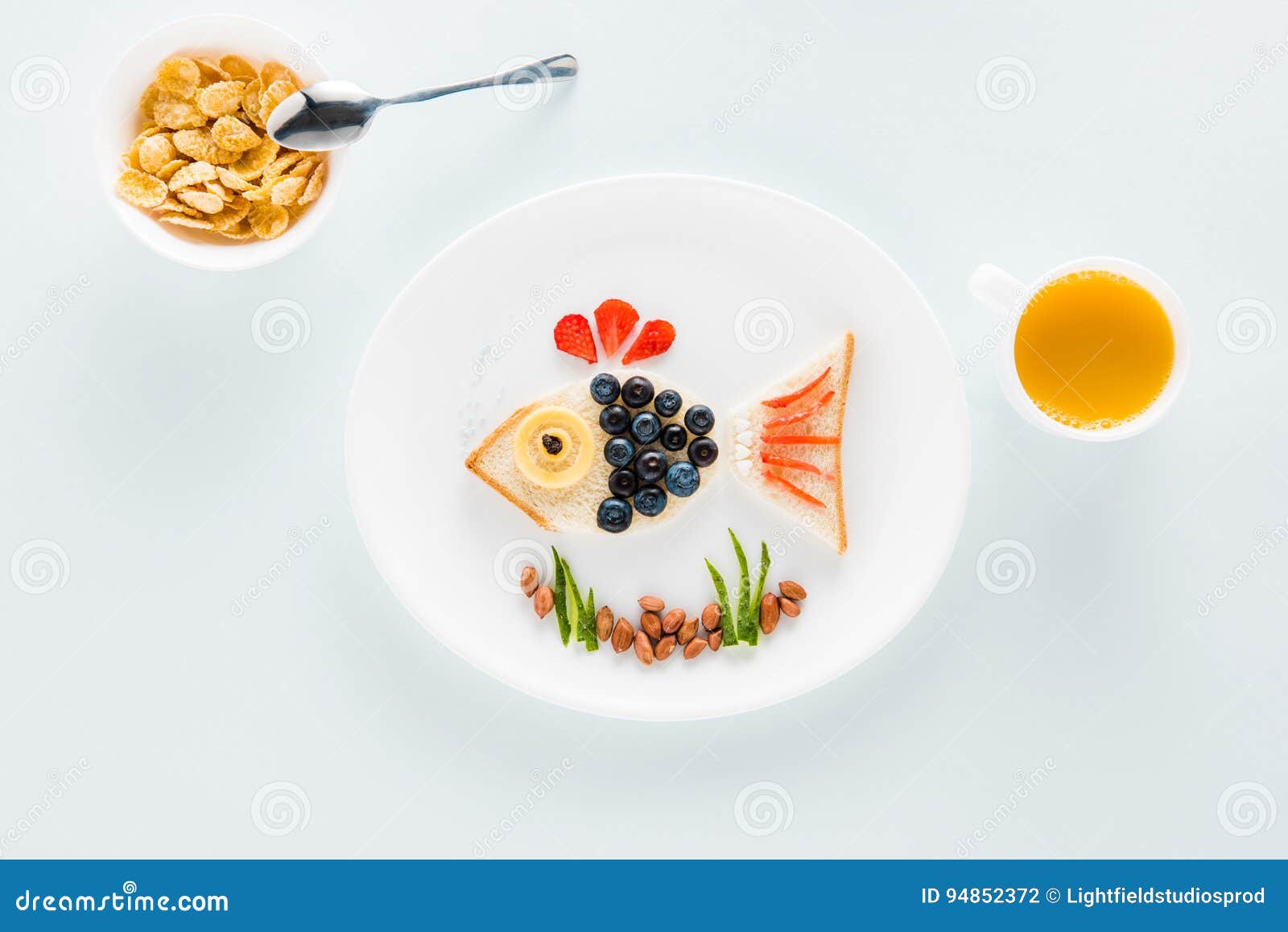 Funny Sandwich in Shape of Fish and Cereal Flakes for Breakfast Stock ...