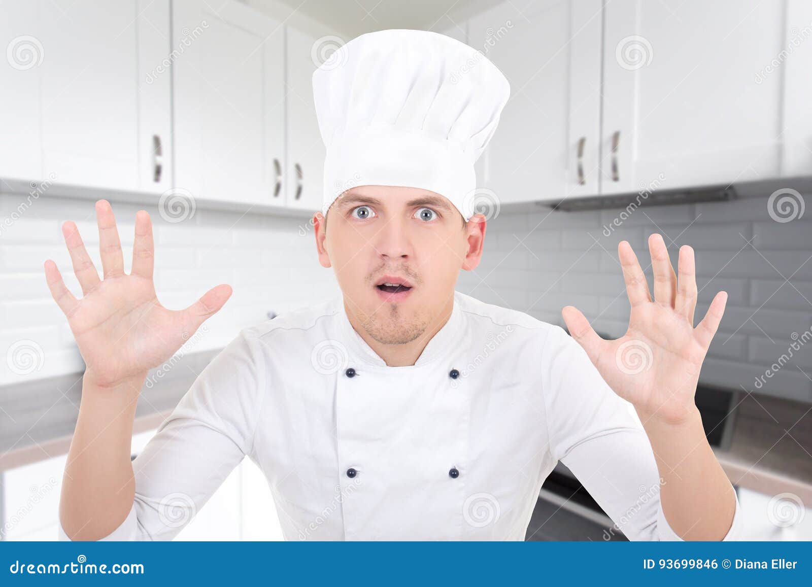 Funny Shocked Man in Chef Uniform in White Modern Kitchen Stock Photo ...